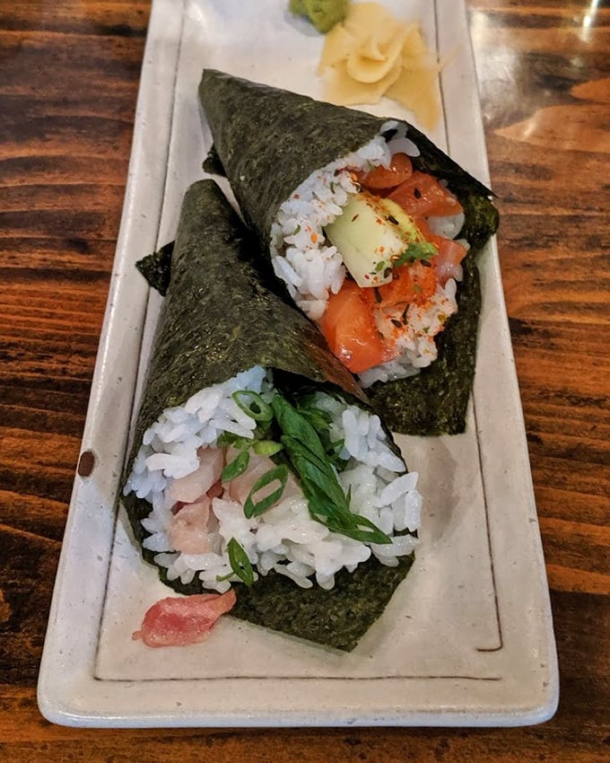 Hand rolls that make you wonder why we bother with plates at all. The nori wrapper stays crisp while holding treasures from both land and sea.
