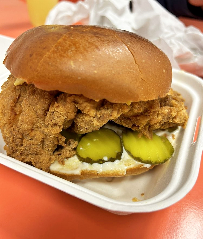 This chicken sandwich with pickles isn't trying to start a fast-food war; it's already won the battle for your taste buds.