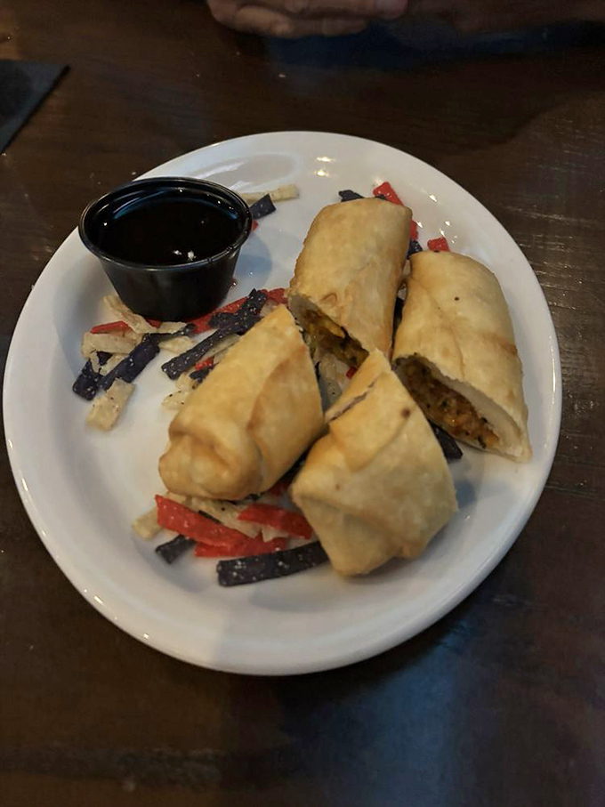 Golden spring rolls that deliver on their spicy promise, perfect for those who like a little heat before the meat.