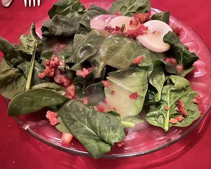 A spinach salad that somehow makes you feel virtuous while enjoying bacon and creamy dressing. The Wisconsin version of having your cake and eating it too.
