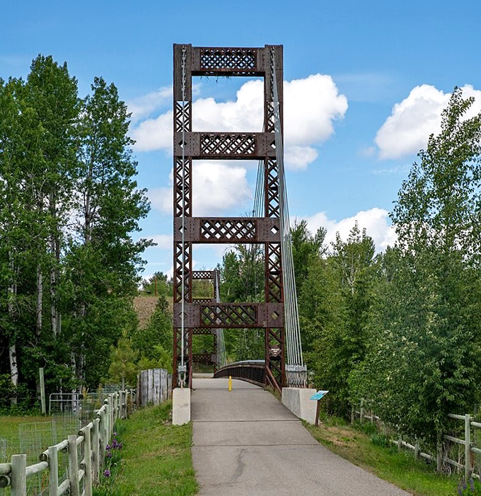 This isn't just any bridge&mdash;it's a portal between everyday life and adventure, standing sturdy against time and the occasional enthusiastic selfie-taker.