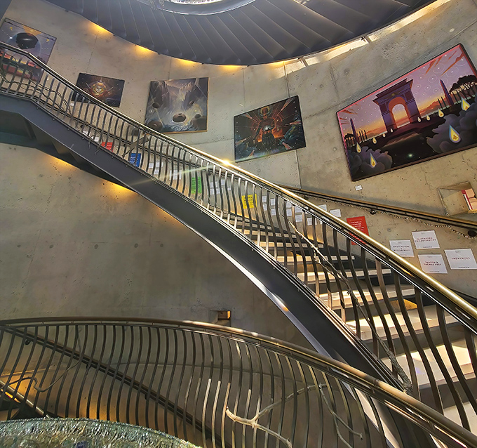 The museum's spiral staircase isn't just functional—it's a sculptural element itself. Surrounded by vibrant artwork, even walking between floors becomes part of the experience.