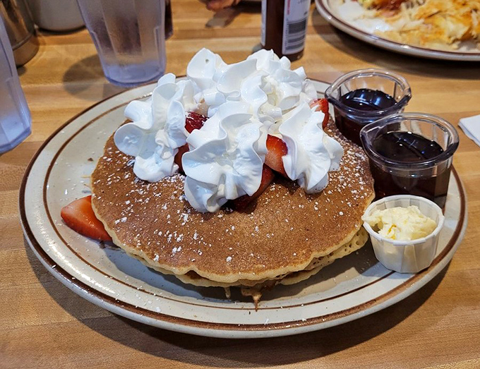 This pancake doesn't just come with strawberries and whipped cream&mdash;it arrives with its own parade of morning happiness.