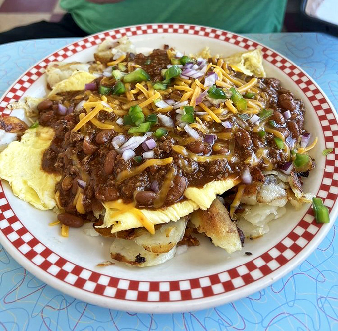The Super Stretch in all its glory—a mountain of hash browns, chili, eggs, and cheese that's defeated many a hungry challenger.