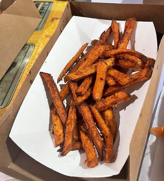 Sweet potato fries with that perfect crisp-outside, tender-inside balance&mdash;the supporting actor that sometimes steals the show from the main attraction.