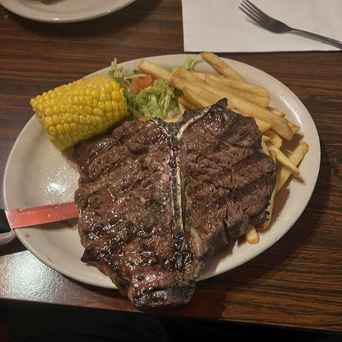 A T-bone steak that would make a vegetarian reconsider life choices, served with the kind of corn-on-the-cob that reminds you summer has a taste.