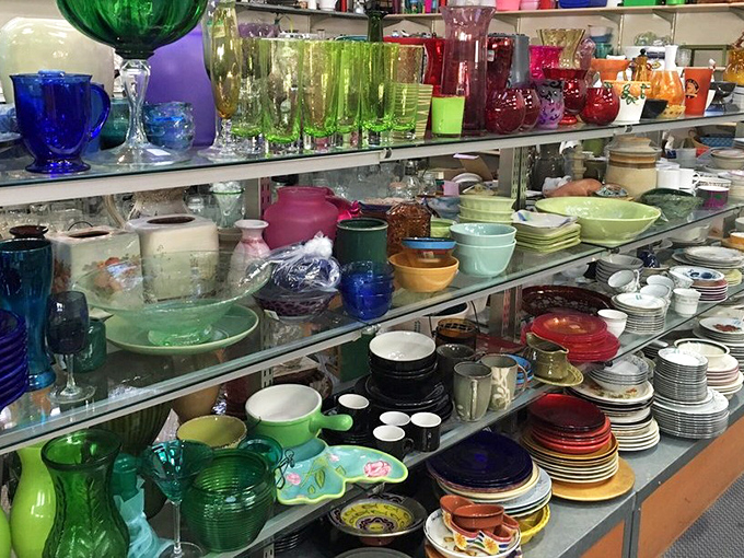 Glassware and dishes displayed like a colorful tapestry of dining possibilities. One person's castoffs become another's entertaining essentials.
