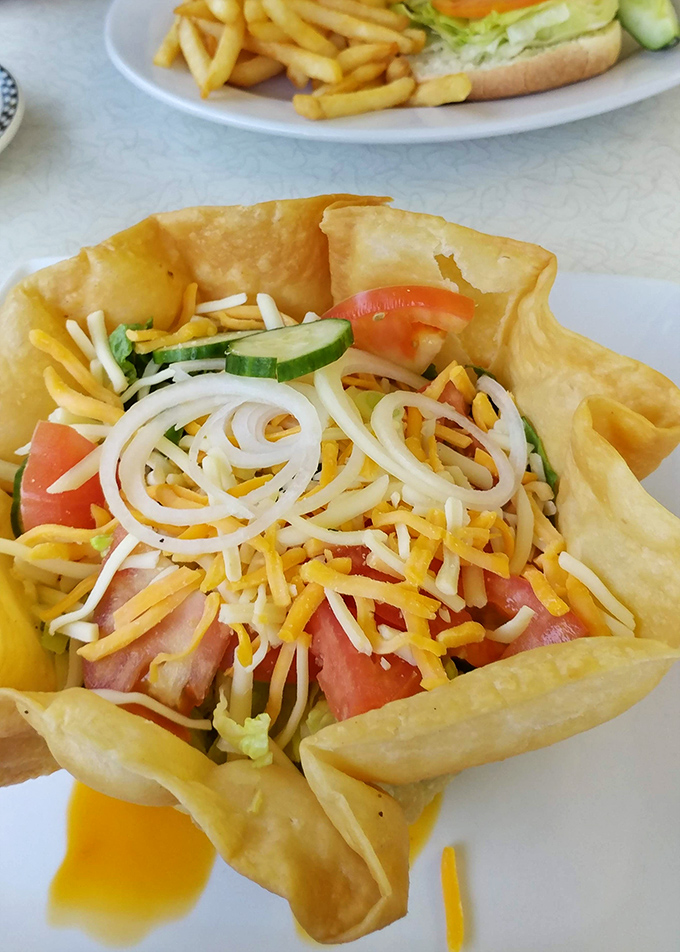 This taco salad isn't just lunch&mdash;it's edible architecture. The crispy shell practically dares you not to photograph it before diving in.