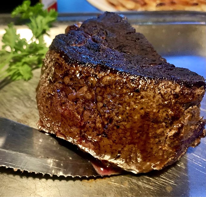 This tenderloin doesn't just raise the steaks—it redefines them. A perfect sear giving way to a center so tender you could cut it with a compliment.