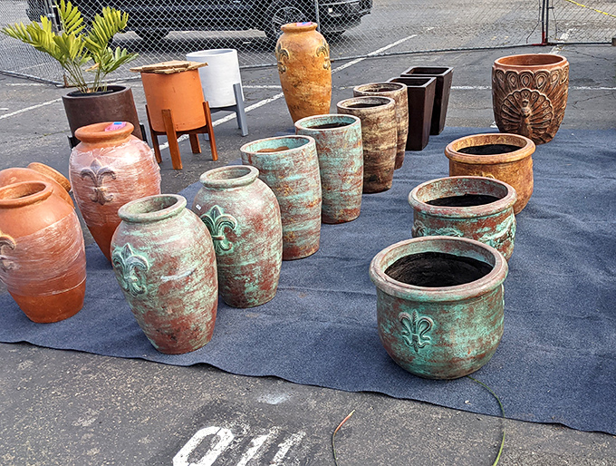 These weathered terracotta and patina-kissed planters aren't just containers &ndash; they're architectural statements waiting to transform a patio or garden corner.