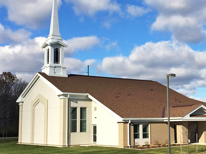 This modest church represents Bryan's spiritual side, where community connections often prove more valuable than material possessions.