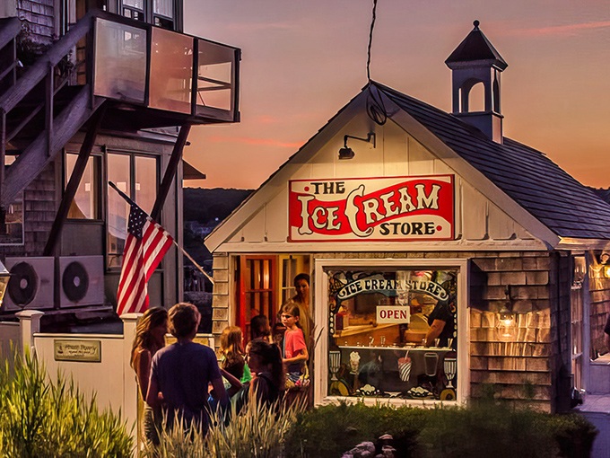The Ice Cream Store at sunset draws crowds like moths to a very delicious, frozen flame.