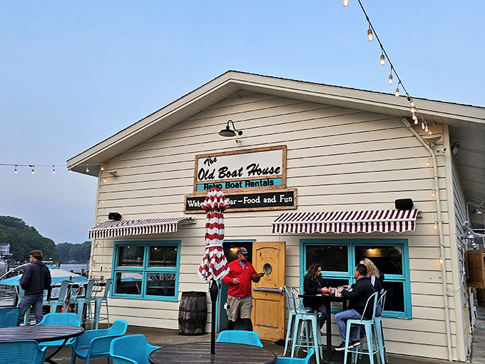 The Old Boat House proves that the best waterfront bars don't need fancy cocktails – just cold drinks, simple food, and a deck where time slows to a vacation pace.