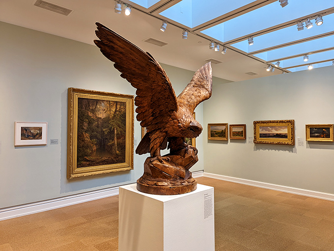 Art takes flight at The Westmoreland Museum, where this magnificent eagle sculpture soars above landscapes that capture Pennsylvania's natural beauty.
