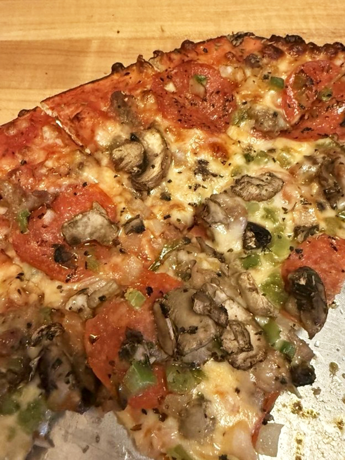 A masterclass in topping distribution. Every bite promises the perfect ratio of cheese, sauce, and toppings&mdash;the pizza equivalent of hitting all green lights on your commute.