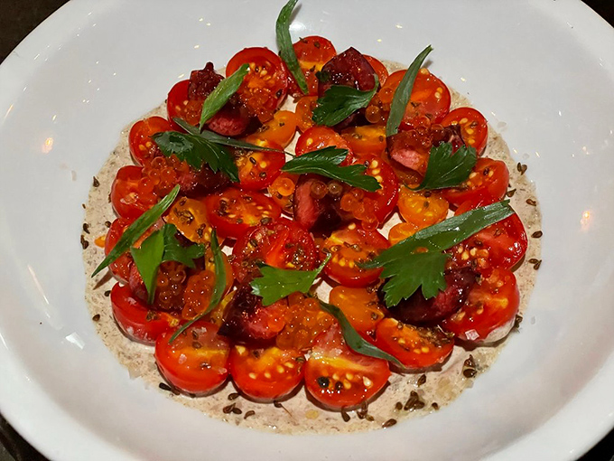 A garden of cherry tomatoes that looks like modern art. This dish proves vegetables can be the main event, not just the opening act.