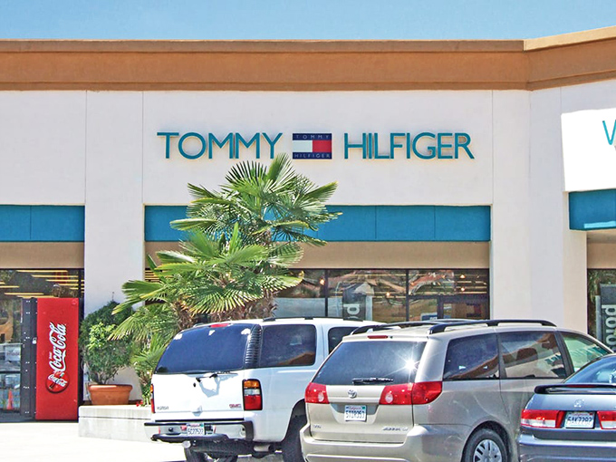 Tommy Hilfiger's nautical aesthetic feels right at home near the Pacific. That palm tree is practically auditioning to be in their next catalog.