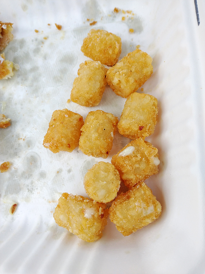 These golden tots aren't just potato nuggets&mdash;they're crispy little time machines that transport you back to the best school lunch you never had.