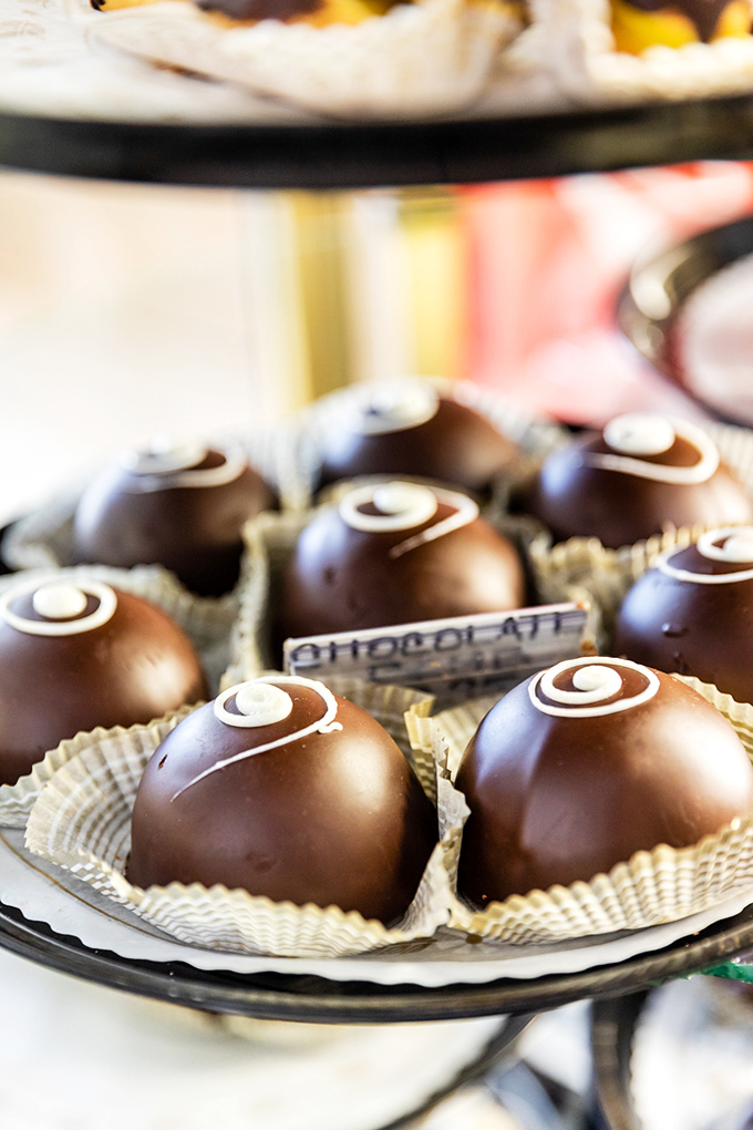 Chocolate truffles so perfectly formed they belong in a museum. Each spiral design promises a moment of pure cocoa bliss.