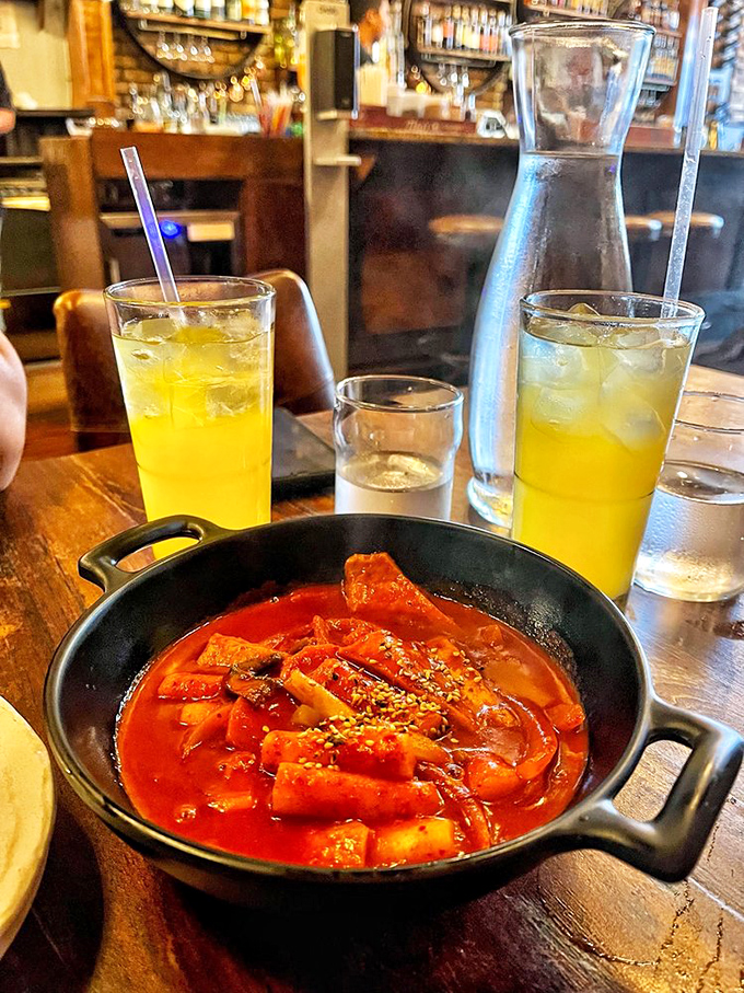 Tteokbokki swimming in spicy-sweet glory &ndash; these rice cakes know how to throw a party in your mouth.