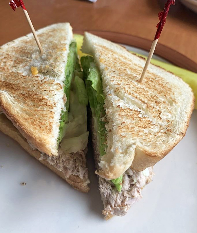 The humble tuna sandwich, elevated to art form with proper toasting and the crucial structural integrity that prevents mid-bite collapse.