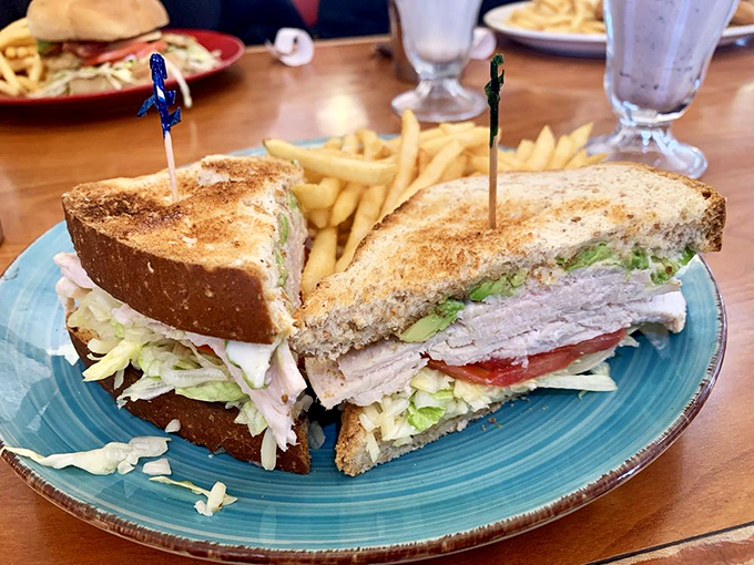 A sandwich architecture so perfect it deserves its own blueprint. Those toothpick supports aren't decorative&mdash;they're structural necessities. 