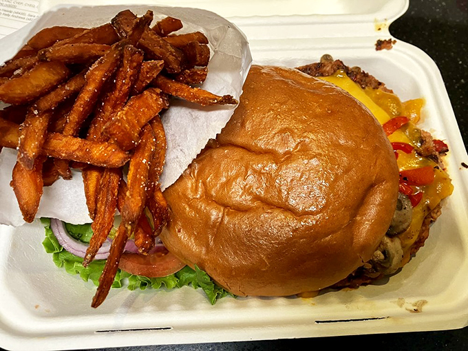 Even vegetarians get the royal treatment&mdash;this veggie burger with sweet potato fries proves plant-based doesn't mean pleasure-free.