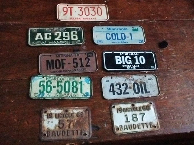These weathered license plates aren't just car accessories&mdash;they're state-by-state snapshots of American road trips, family vacations, and cross-country adventures long concluded.