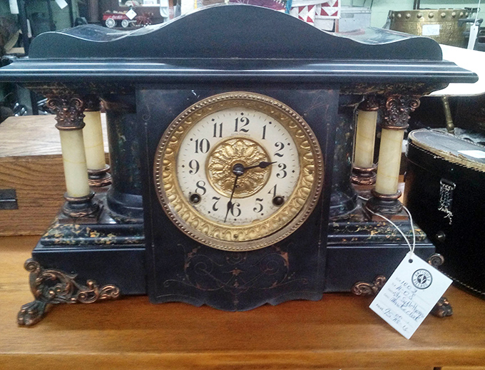 This ornate mantel clock doesn't just tell time &ndash; it's a portal to an era when craftsmanship meant intricate details and lasting quality.