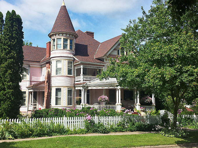 Victorian splendor lives on at the Heritage Inn, where wraparound porches and turrets create a postcard-perfect scene that whispers "slow down and stay awhile."