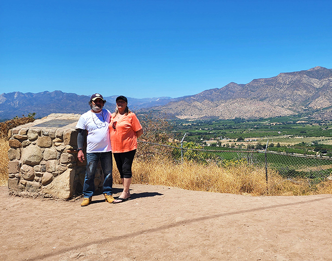 Visitors pause for a photo, knowing full well their camera can't possibly capture what their eyes&mdash;and souls&mdash;are experiencing in this moment.