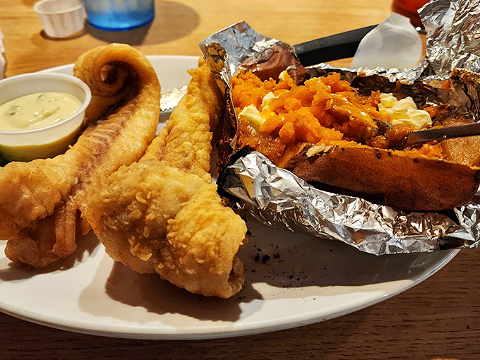 Seafood and loaded baked potato sharing a plate with fried perfection &ndash; proof that Bill's isn't just a one-trick pony.