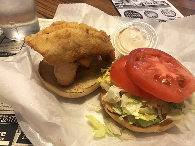 The walleye sandwich &ndash; Lake Erie's other star fish &ndash; dressed simply with fresh tomato and lettuce. Sometimes perfection needs no embellishment.