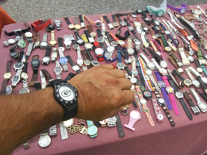 Time literally stands still at this watch vendor's display, where wristwatches of every style create a mosaic of moments waiting to be rewound.