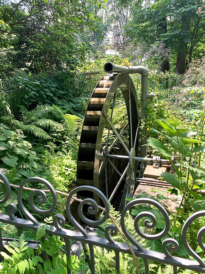 The water wheel adds old-world charm, spinning lazily like it's got nowhere important to be.