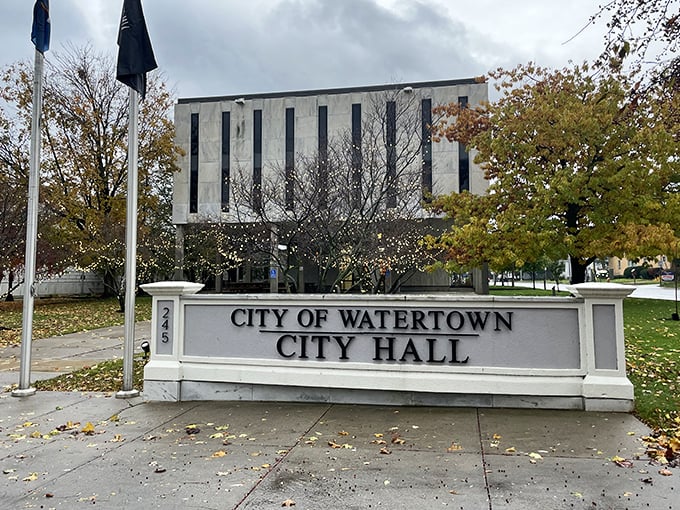 Watertown City Hall stands proudly amid autumn leaves, a testament to municipal architecture that actually makes bureaucracy look dignified.