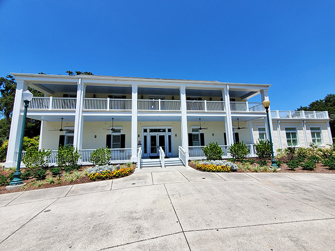 The stately Leu House Museum welcomes visitors with classic Southern charm and a porch that practically whispers, "Come sit a spell."
