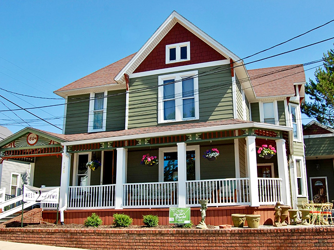 This charming Victorian home with its welcoming porch practically whispers, "Slow down and stay awhile," in the universal language of Midwestern hospitality.