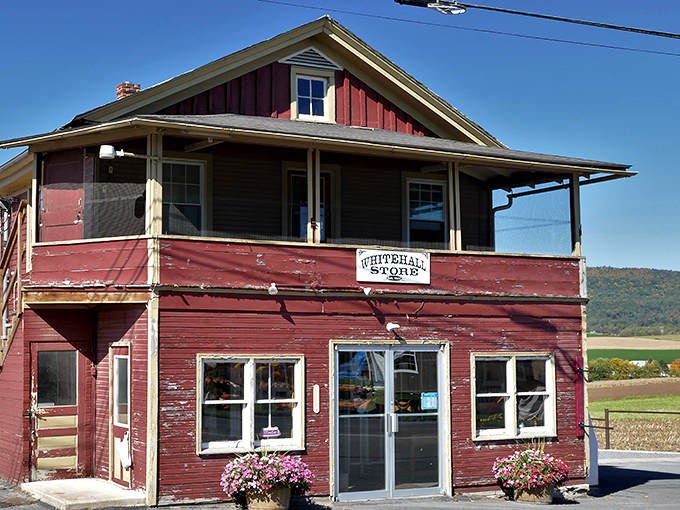 Whitehall Store's weathered red exterior tells stories of countless transactions, conversations, and community connections spanning decades of rural life.