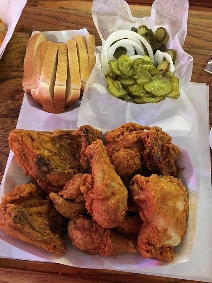 The holy trinity of Eischen's: fried chicken, white bread, and pickles. A combination so perfect it makes you question why anyone would complicate matters.