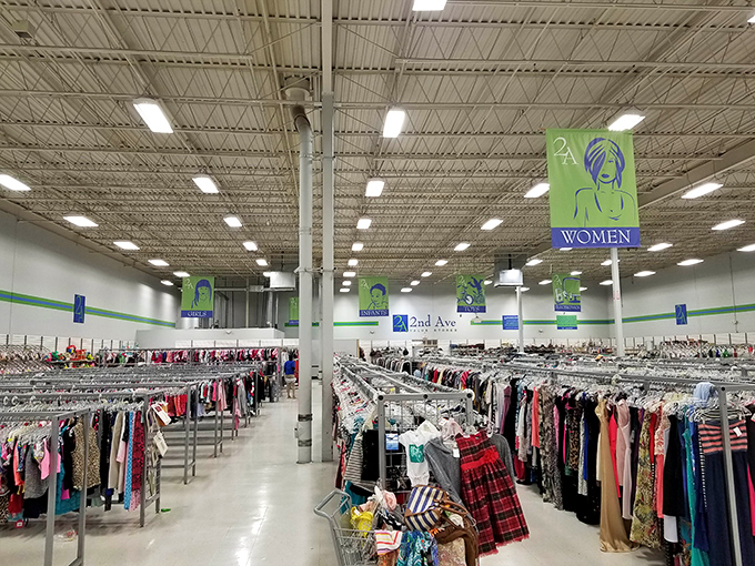 The women's clothing section stretches to infinity, a kaleidoscope of fashion eras where vintage meets modern in a democratic display of style.