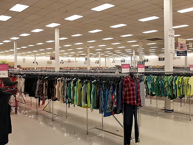 Fashion hunters in their natural habitat, scanning racks with the focus of archaeologists uncovering artifacts from the not-so-distant past.