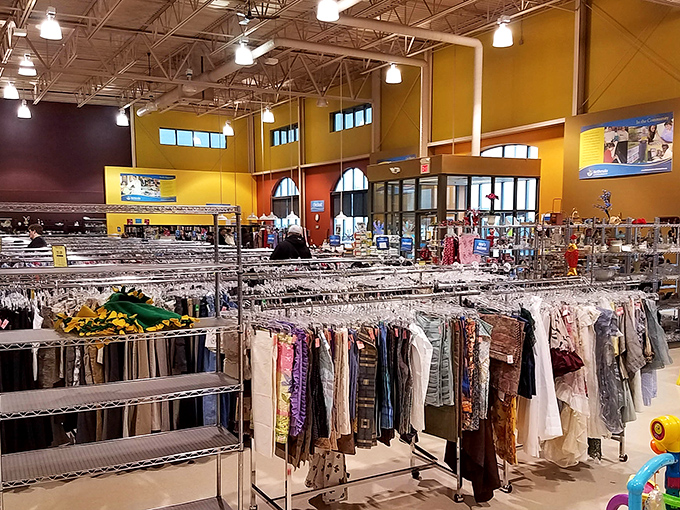 High ceilings and thoughtful organization create a thrifting experience that feels more department store than rummage sale.