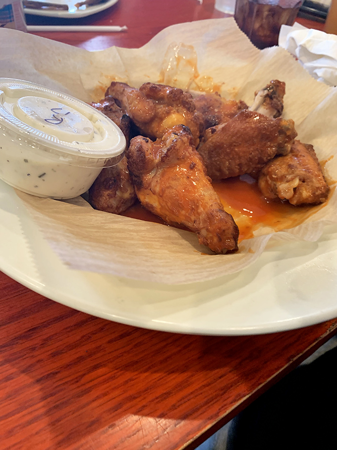 Buffalo wings that make you question why you even came for pizza in the first place. The perfect crispy-saucy balance exists.