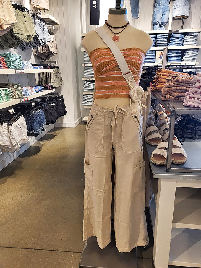 Summer-ready mannequins showcase the season's casual trends, making you wonder if those wide-leg pants might actually work for you too.