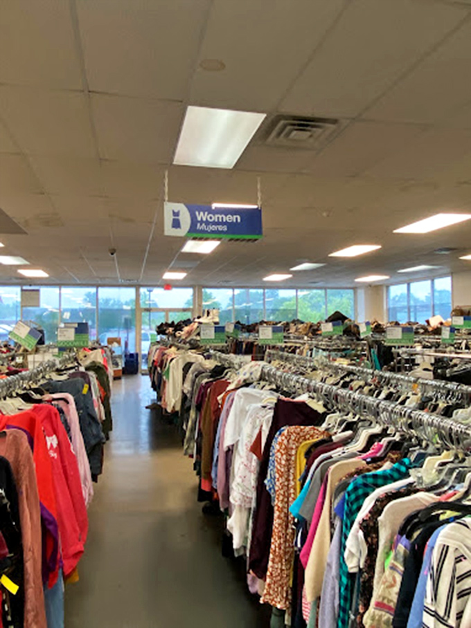 The women's section: a textile time machine where vintage finds mingle with last season's mall brands in perfect, color-coded harmony.