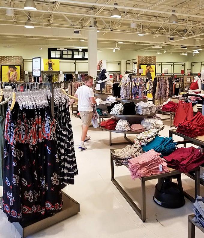Women's fashion displays that somehow make you believe you'll suddenly start hosting garden parties. That mannequin knows you live in yoga pants but is silently encouraging your aspirational purchasing.