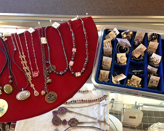 Jewelry that tells stories&mdash;previous lives sparkle on red velvet displays. Someone's forgotten statement piece becomes your new conversation starter.