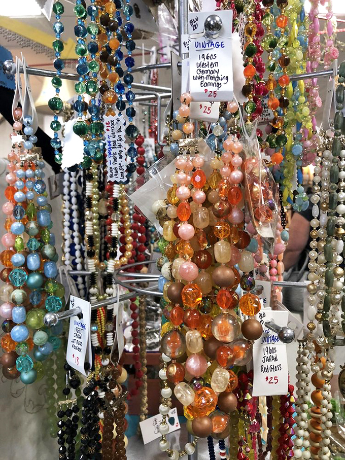 A kaleidoscope of vintage beads and baubles waiting to adorn new necks. Each strand tells a story from decades past.
