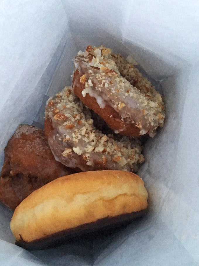These aren't just donuts; they're edible architecture. The crumb topping adds textural contrast that would make any pastry chef nod in approval.